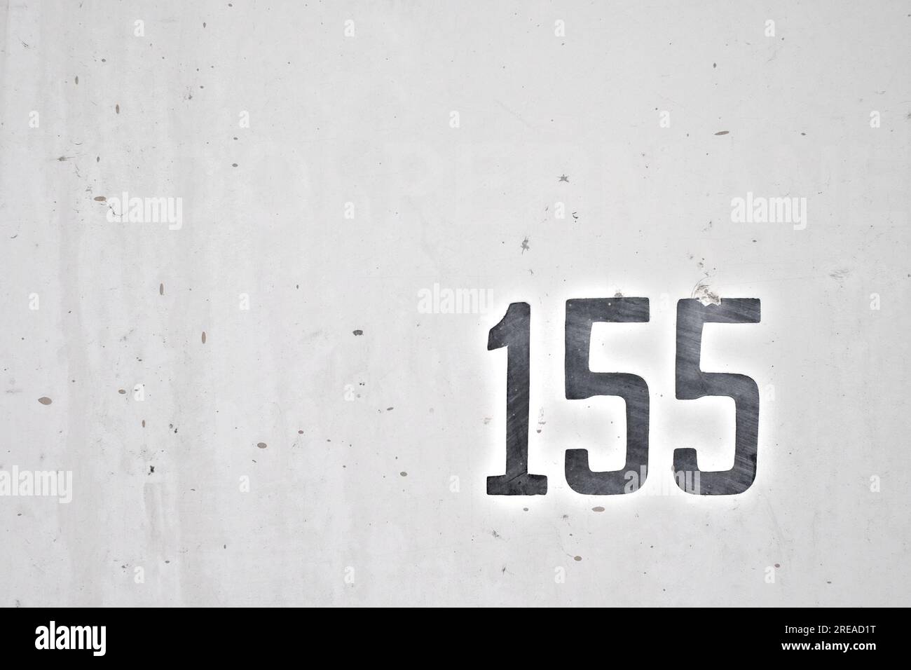 Number one hundred fifty-five, 155, black stencil on white background ...