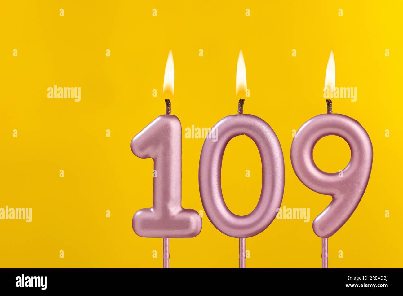 Birthday candle number 109 - Birthday celebration on yellow background ...