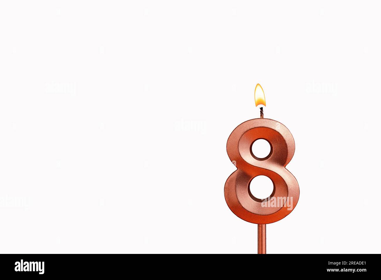 Burning candle number 8 for birthday on white background Stock Photo ...