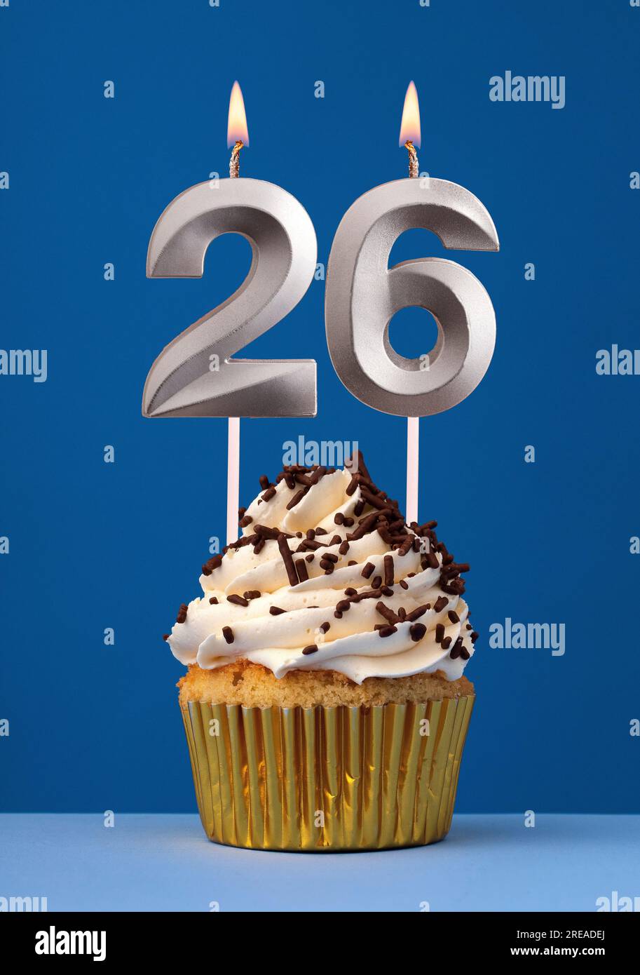 Horizontal birthday card with cake - Lit candle number 26 on blue ...