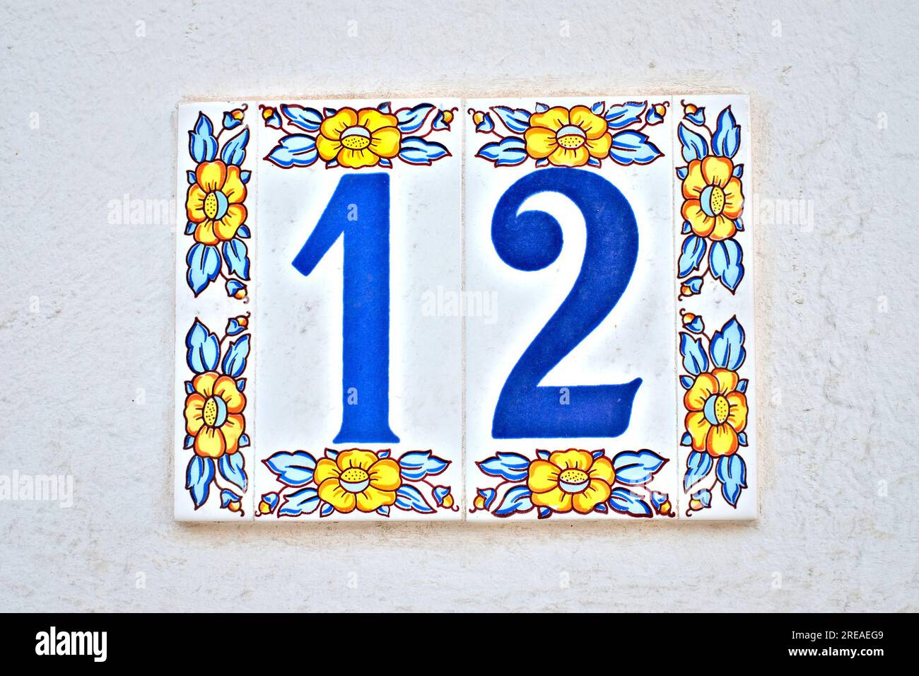 Number 12, twelve, joyful floral blue digits on light almost white ...