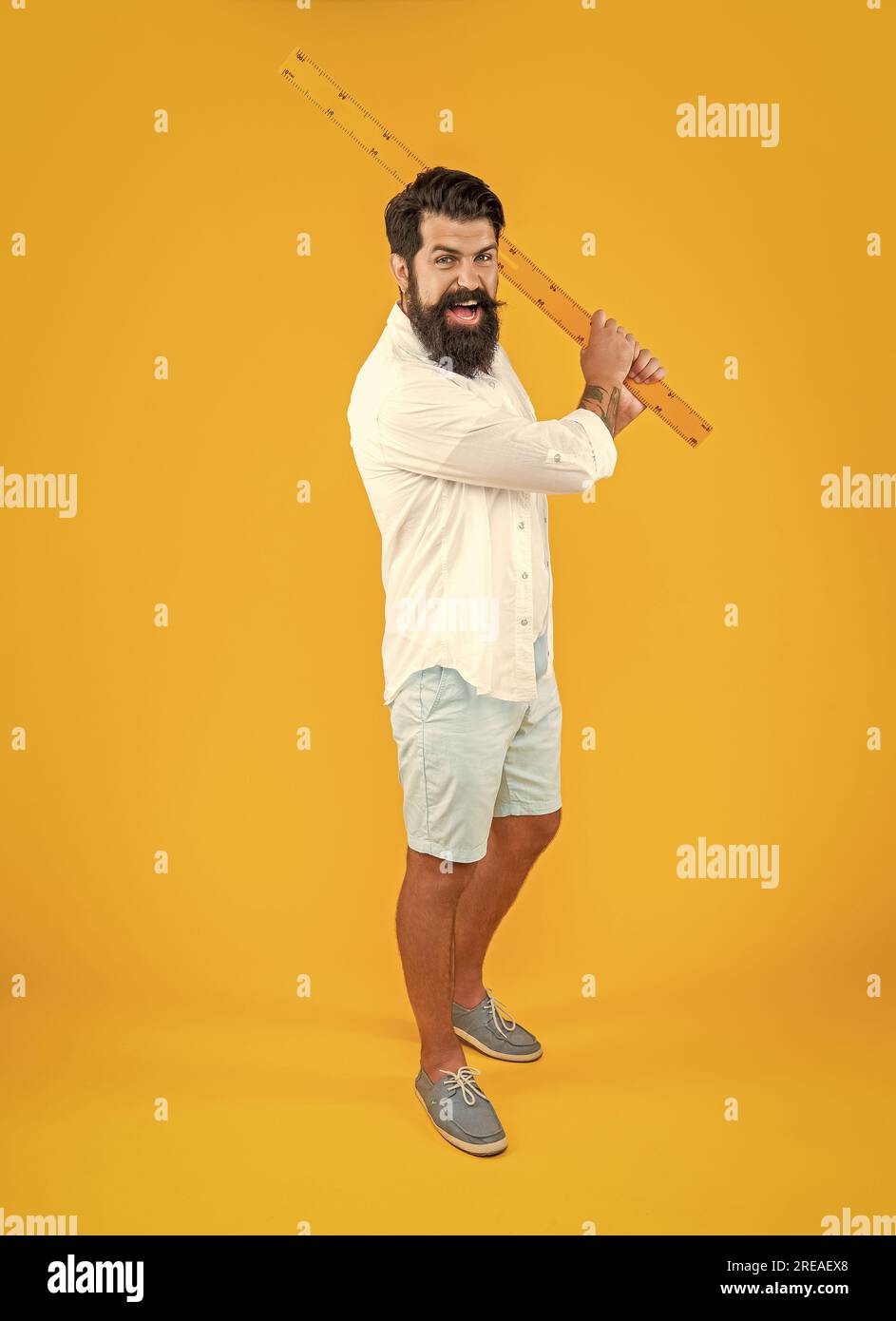 Angry teacher and ruler hi-res stock photography and images - Alamy