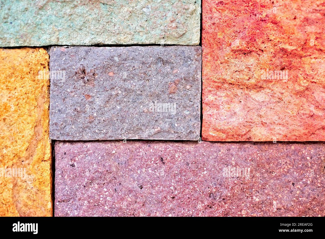 Patchwork of colorful blocks, stone masonry example Stock Photo - Alamy