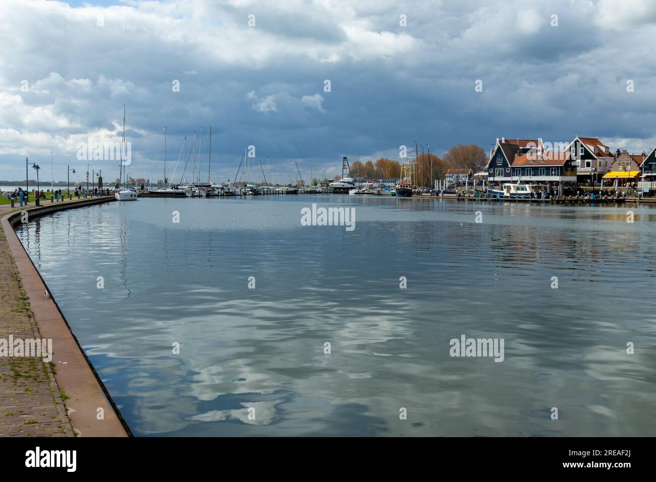 Dutch coastal village with huge lake and cloudy sky in Amsterdam Stock ...