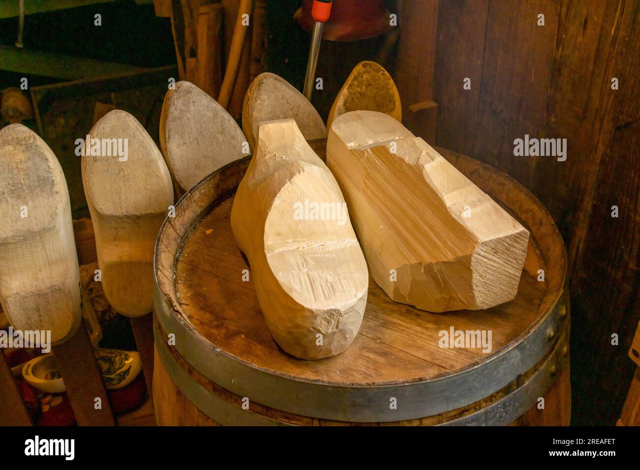 Traditional factory making wooden dutch clogs from solid wood Stock ...