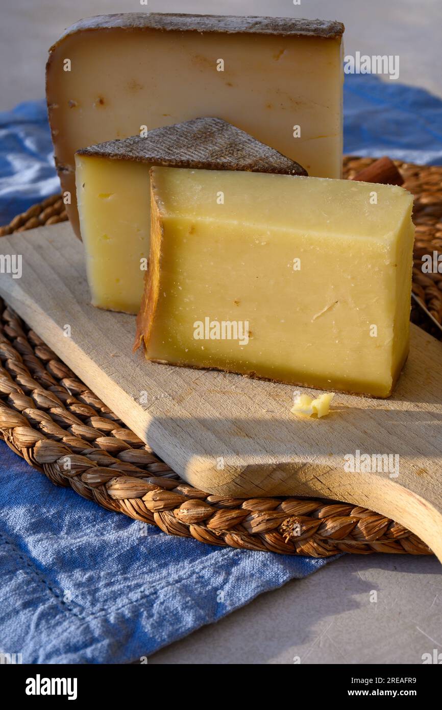 Cheese collection, French cow cheese comte, beaufort, abondance close ...
