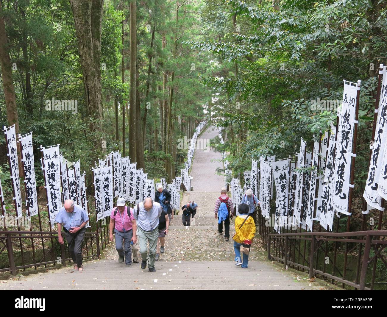 158 stone steps flanked on either side by white banners lead up to the ...