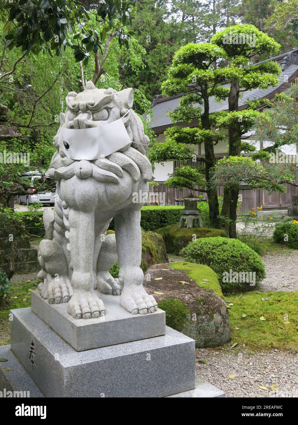 Stone statue of a lion at Hongu Taisha Shinto Shrine, one of the Three ...