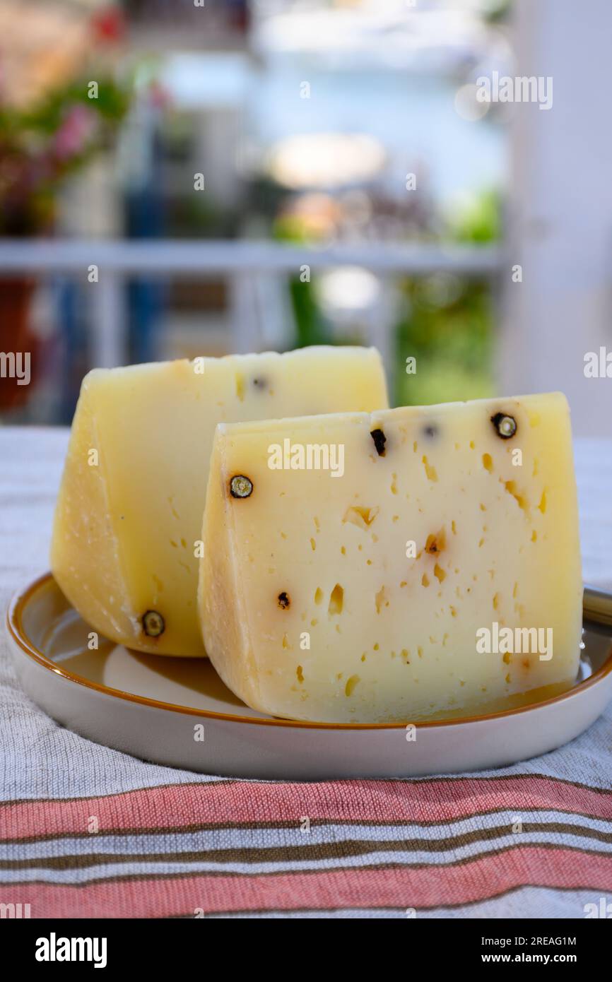 Cheese collection, Italian aged pecorino cheese with black peppers made ...
