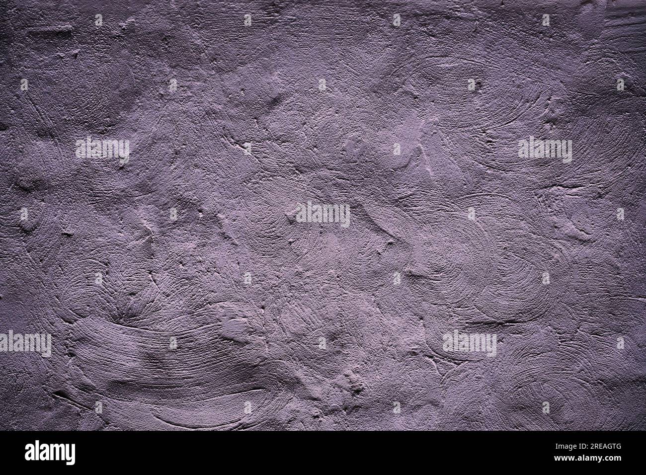 Rough textured surface white with pink / magenta cast and dark ...