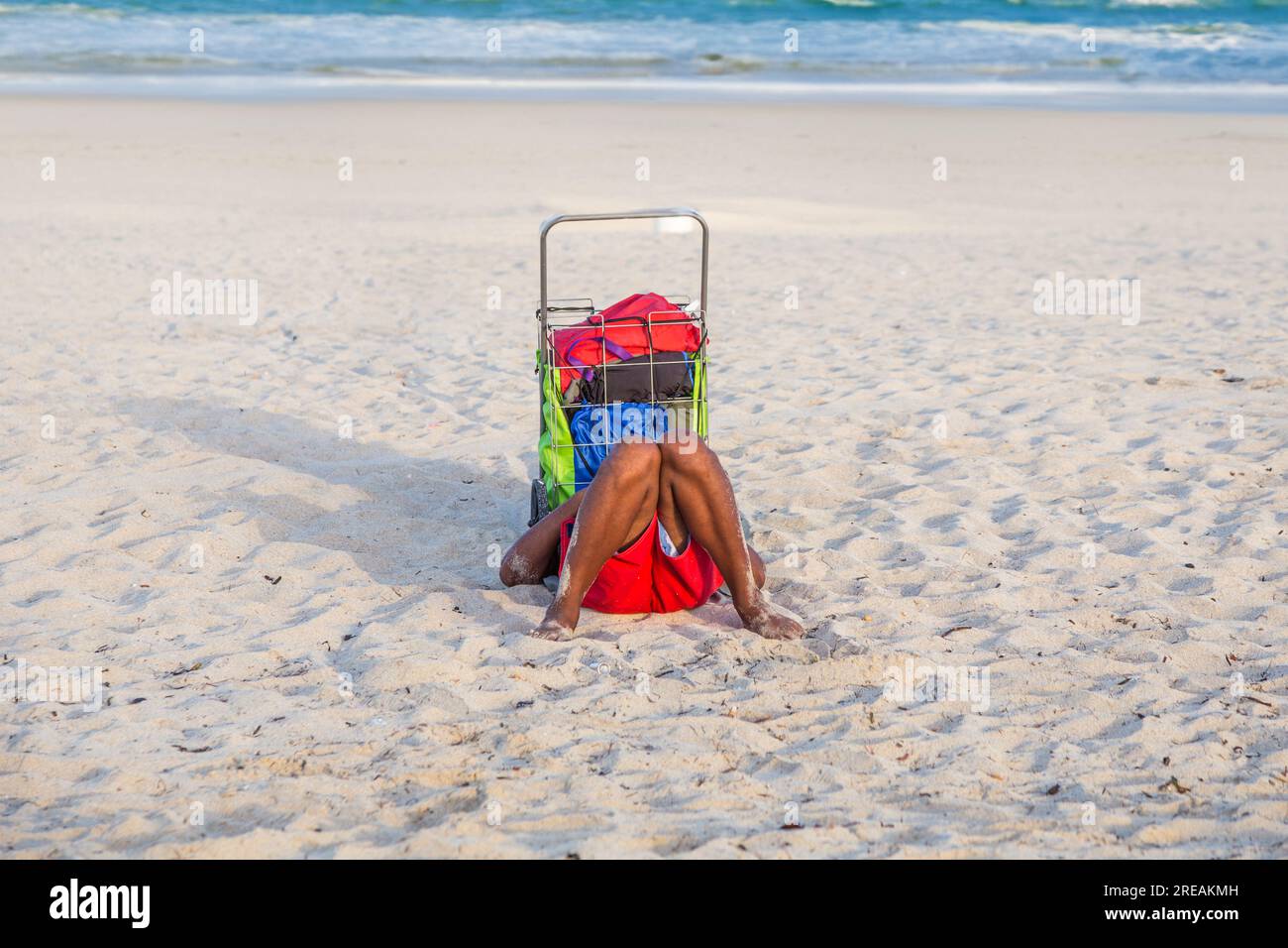 Miami, USA - August 20, 2014: man relaxes at the beach at late ...