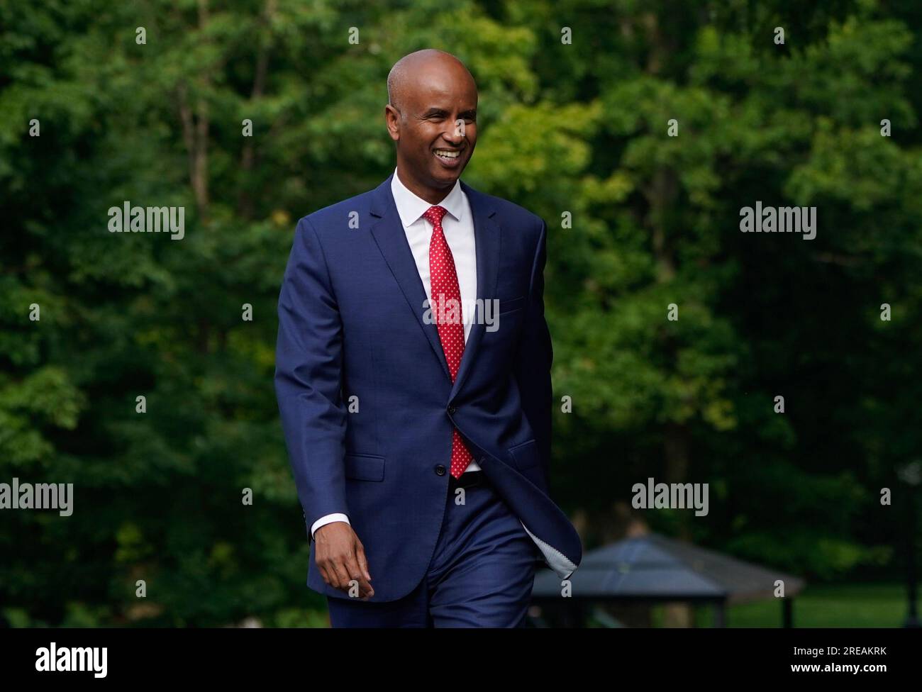 Ottawa, Canada. 26th July, 2023. Ahmed Hussen smiles as he walks to a ...