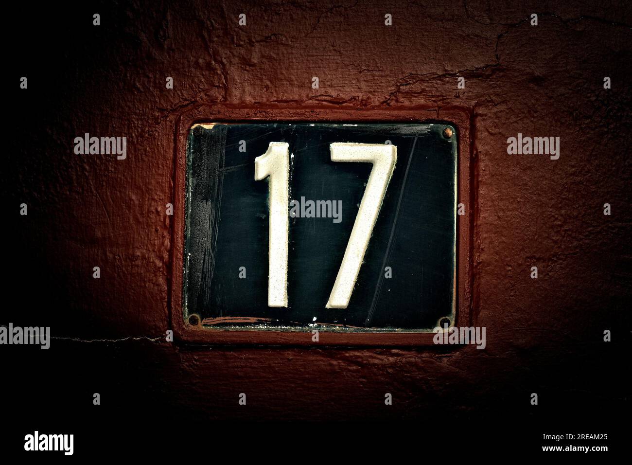 Number 17, seventeen, dark and vignetted Stock Photo - Alamy