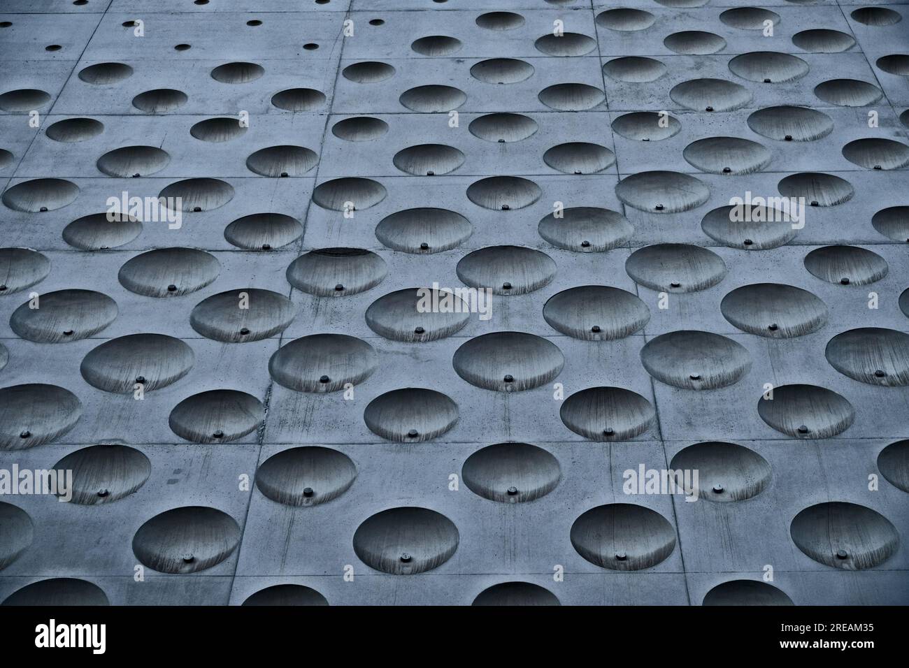 An abstract concrete surface with circular textured pattern Stock Photo ...