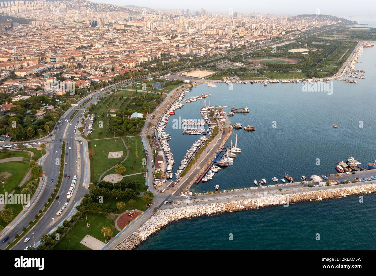 Drone view Maltepe Sahil at sunset. Aerial view of over park and harbor ...