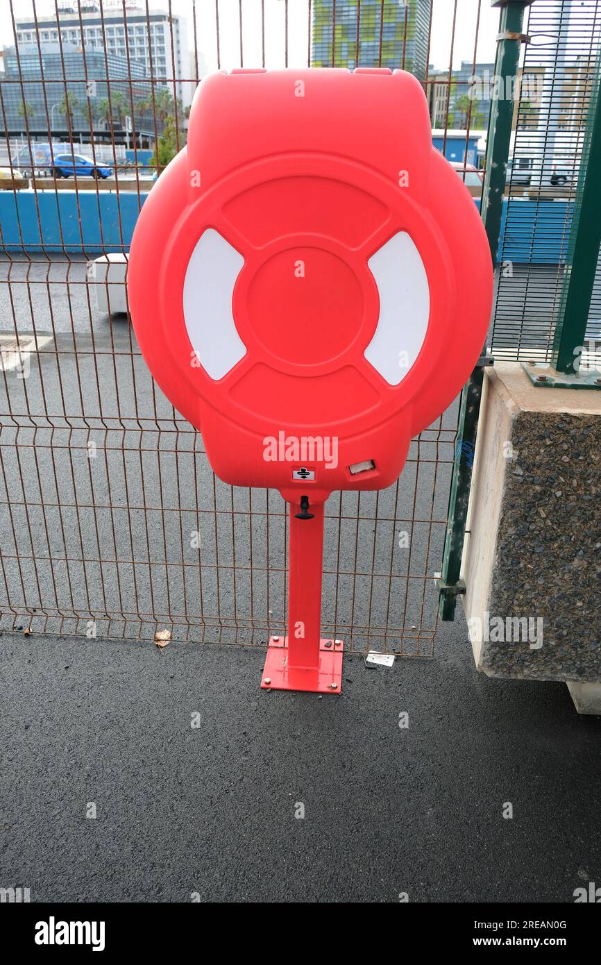 Life ring in a cover - harbour safety equipment Stock Photo - Alamy