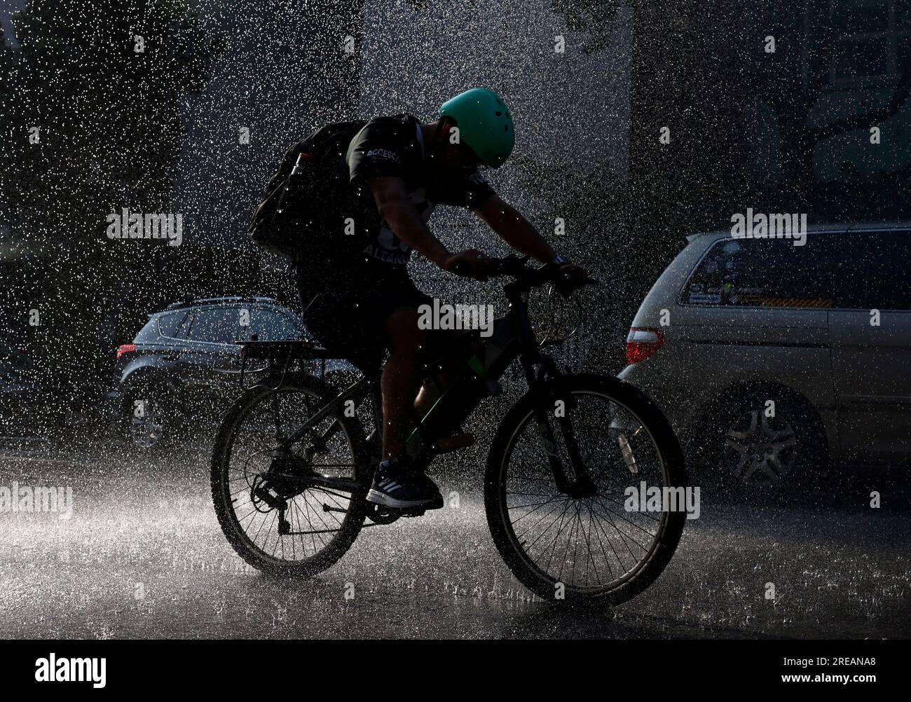 Hot weather cyclist hi-res stock photography and images - Alamy