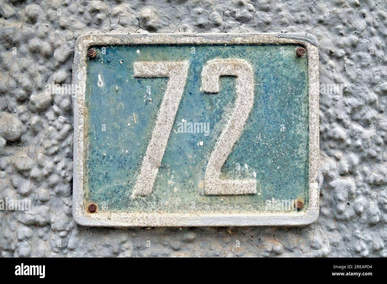 Number 72, seventy-four, on a pale blue background Stock Photo - Alamy