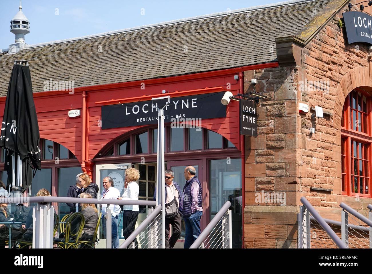 People waiting outside Loch Fyne Restaurant and Bar, Newhaven ...
