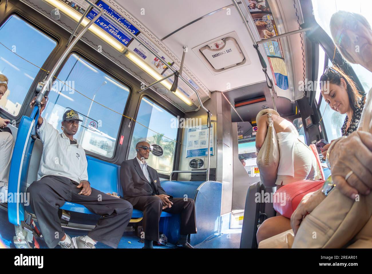 MIAMI, USA - AUG 18, 2014: people in the downtown Metro bus in Miami ...