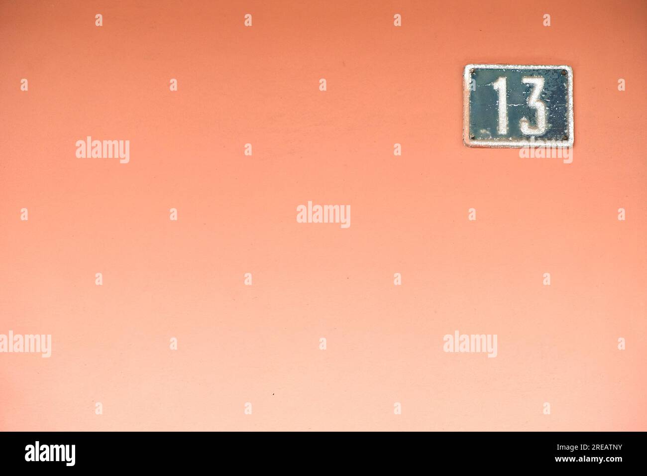 Number 13, thirteen, offset in corner on graded pink background Stock ...