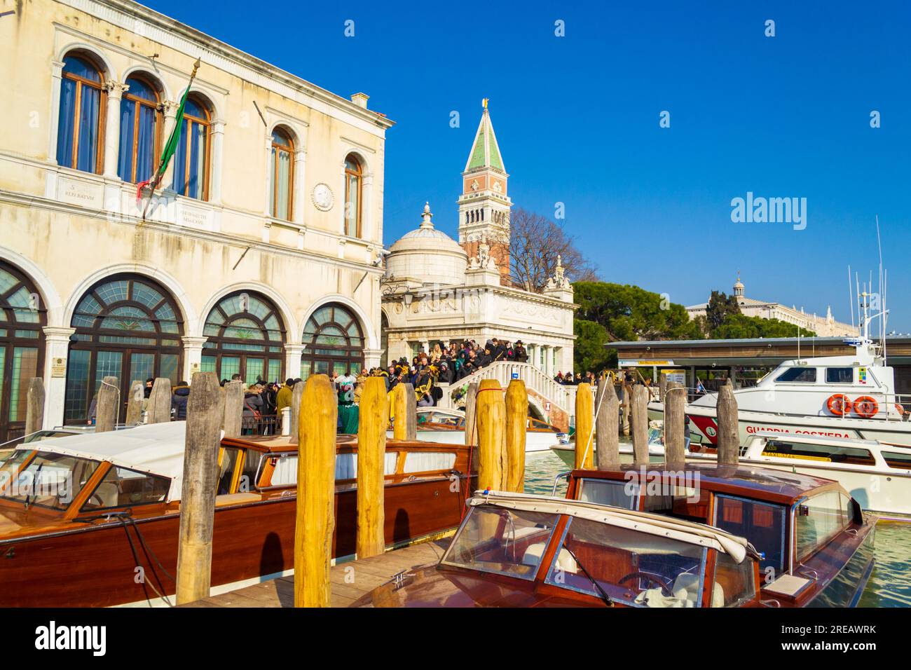 Moored taxi motoboats wooden pier of San Marco Ferry terminal at Grand ...