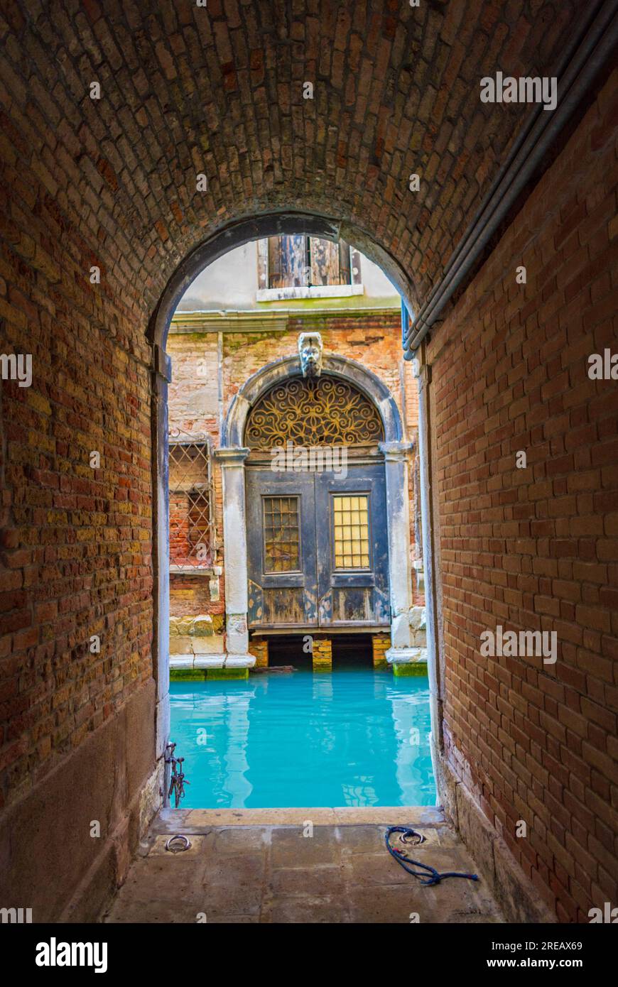 Entrance to an old Venetian house from a canal in Venice, Italy Stock ...