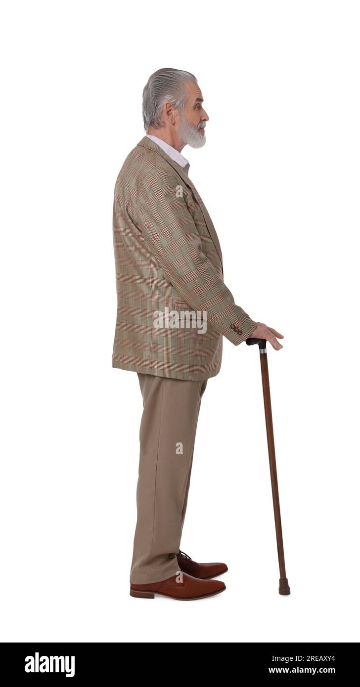 Senior man with walking cane on white background Stock Photo - Alamy