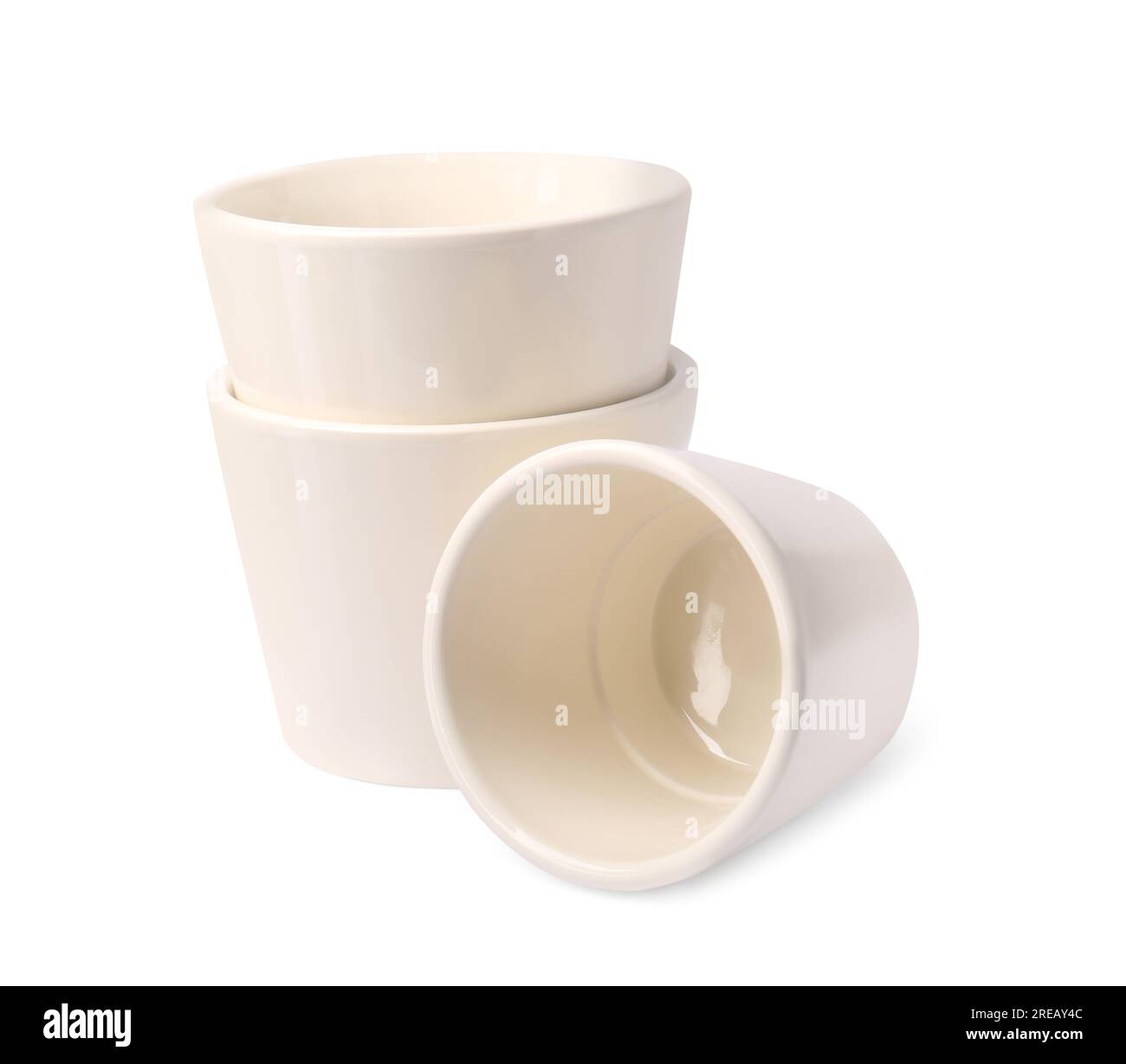 Empty ceramic flower pots on white background Stock Photo - Alamy