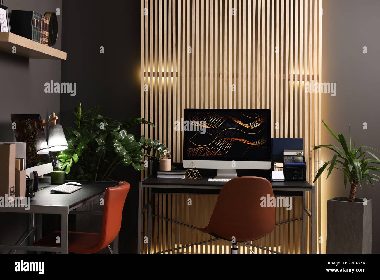 Cozy workspace with computer on metal desk at home Stock Photo - Alamy
