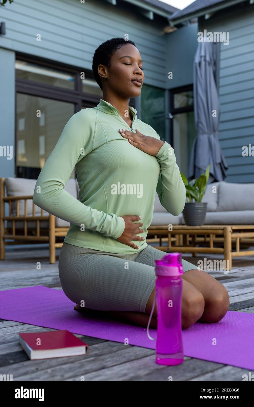 African american woman doing yoga hi-res stock photography and images ...
