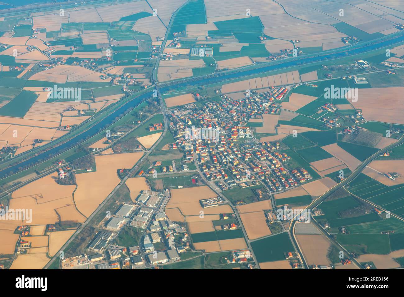 Aerial view of a village in the Netherlands from an airplane window ...