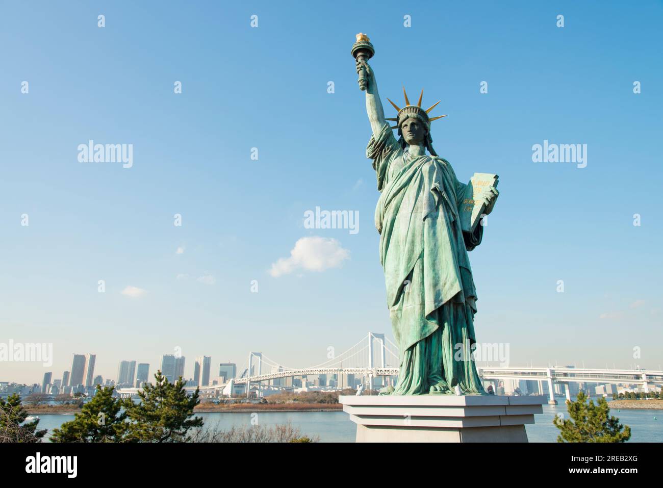 The statue of liberty and Rainbow Bridge Stock Photo - Alamy