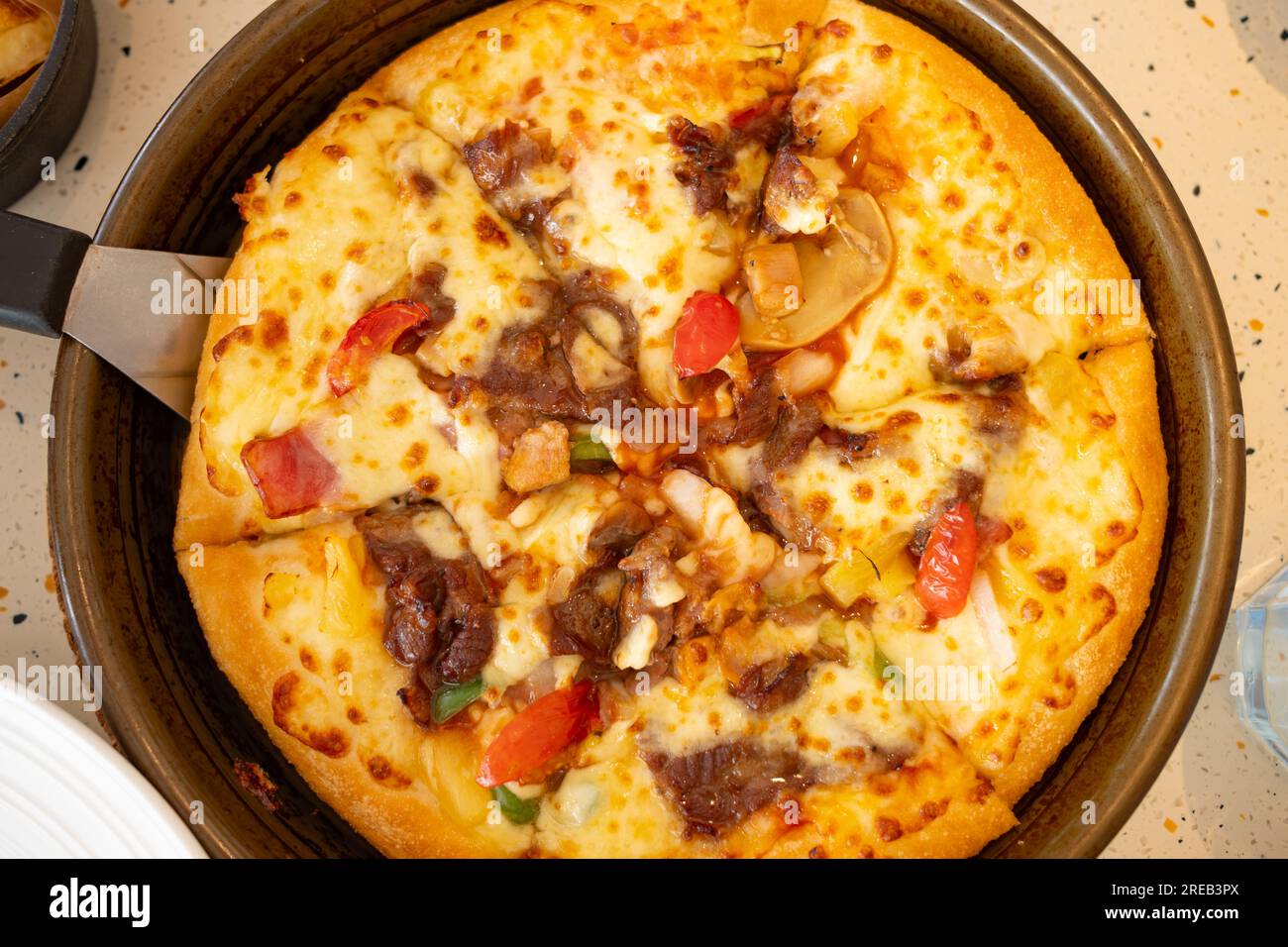 top view fresh beef pizza Stock Photo - Alamy