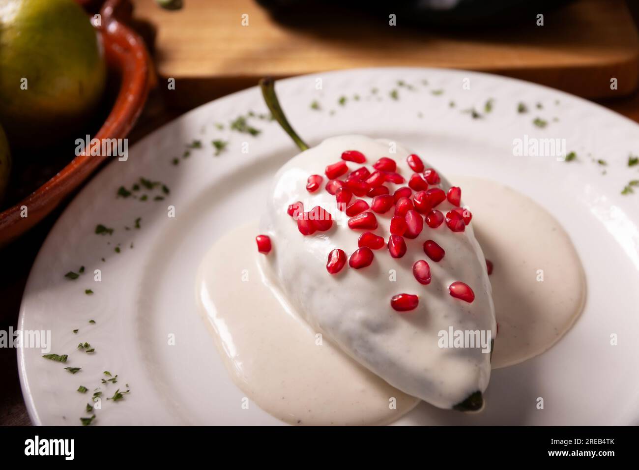 Chiles en Nogada, Typical dish from Mexico. Prepared with poblano chili ...