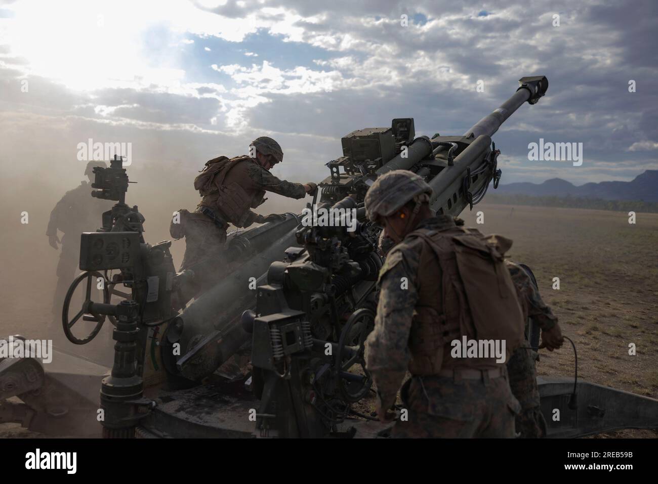 U.S. Marine cannoneers with Battalion Landing Team 2/1, 31st Marine ...