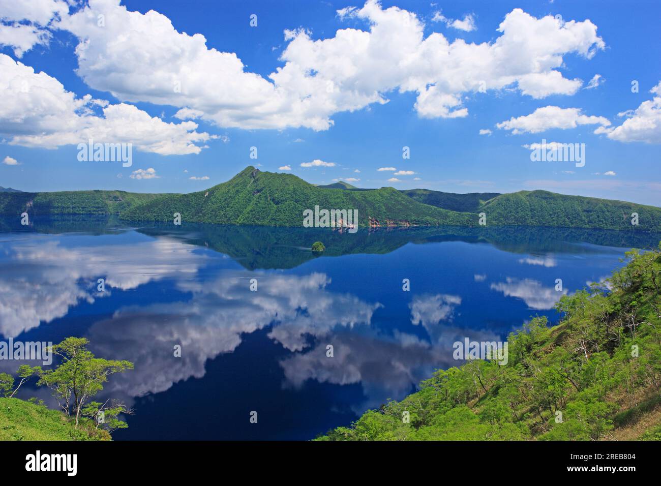 Blue Sky and Clouds Reflected on the Surface of Lake Mashu Ko Stock ...