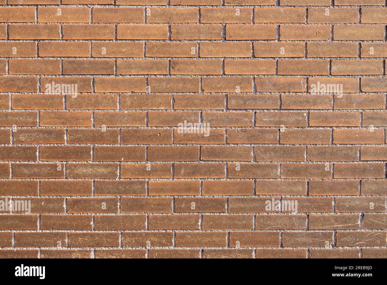 Full frame texture background of a grungy antique orangish brown brick ...