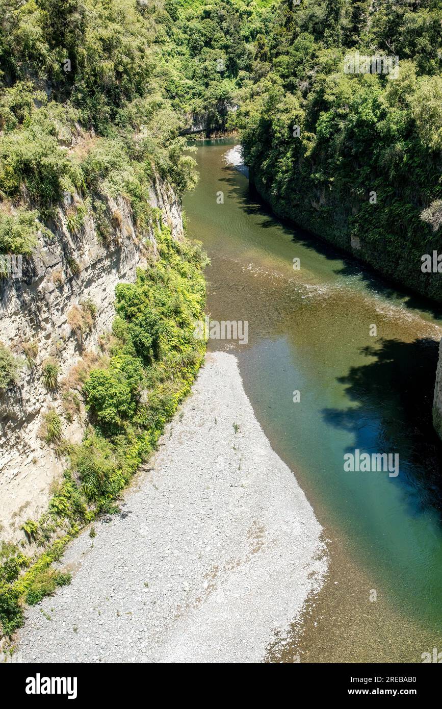 The turquoise water of the Rangitikei river flowing through the ...