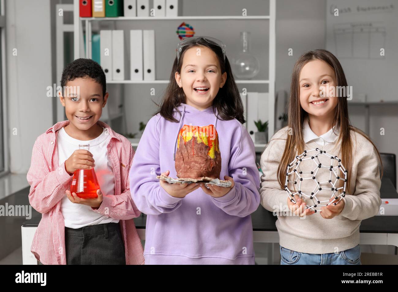 Little children with chemistry equipment in science classroom Stock ...