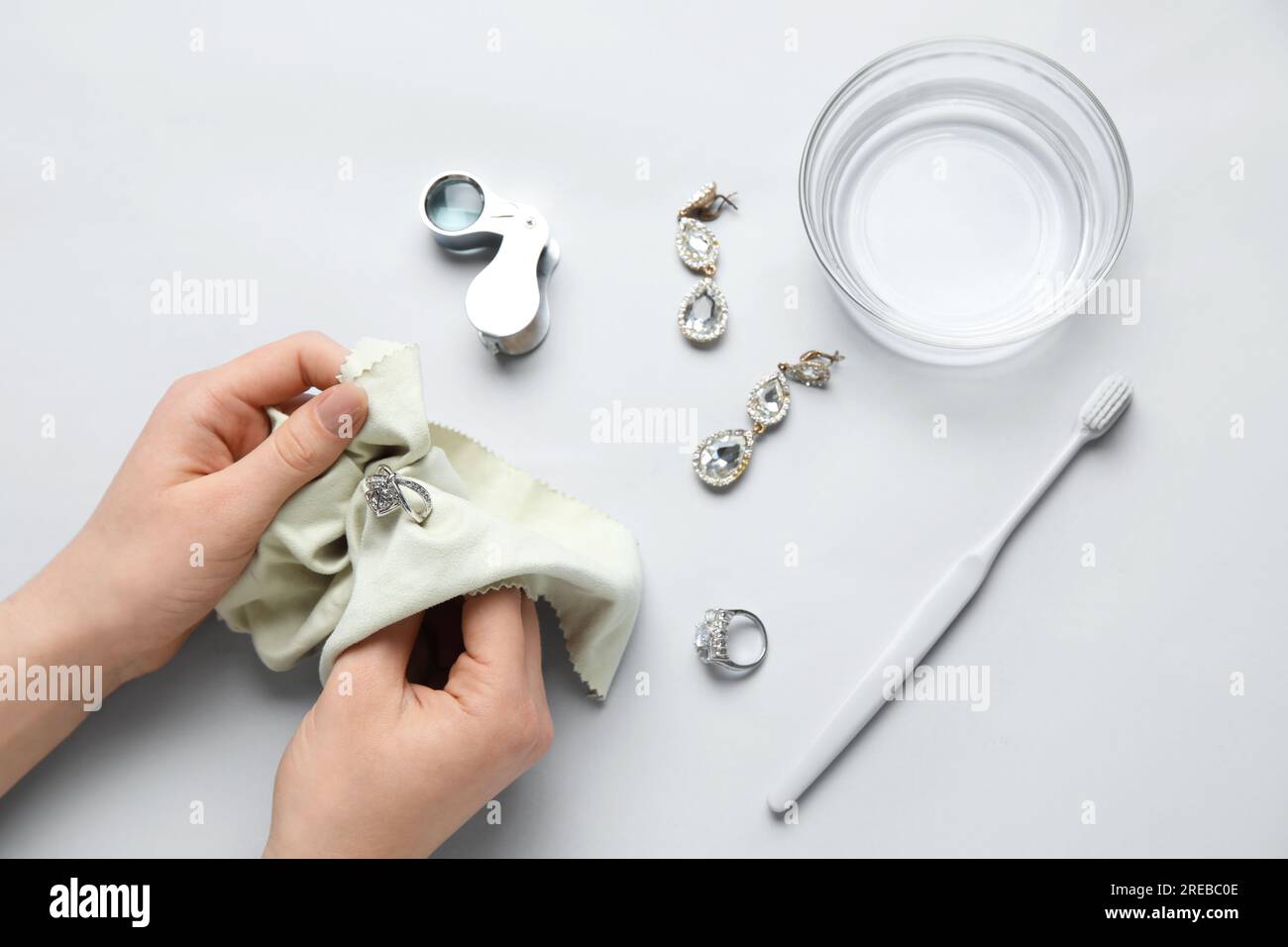 Woman polishing jewellery hi-res stock photography and images - Alamy