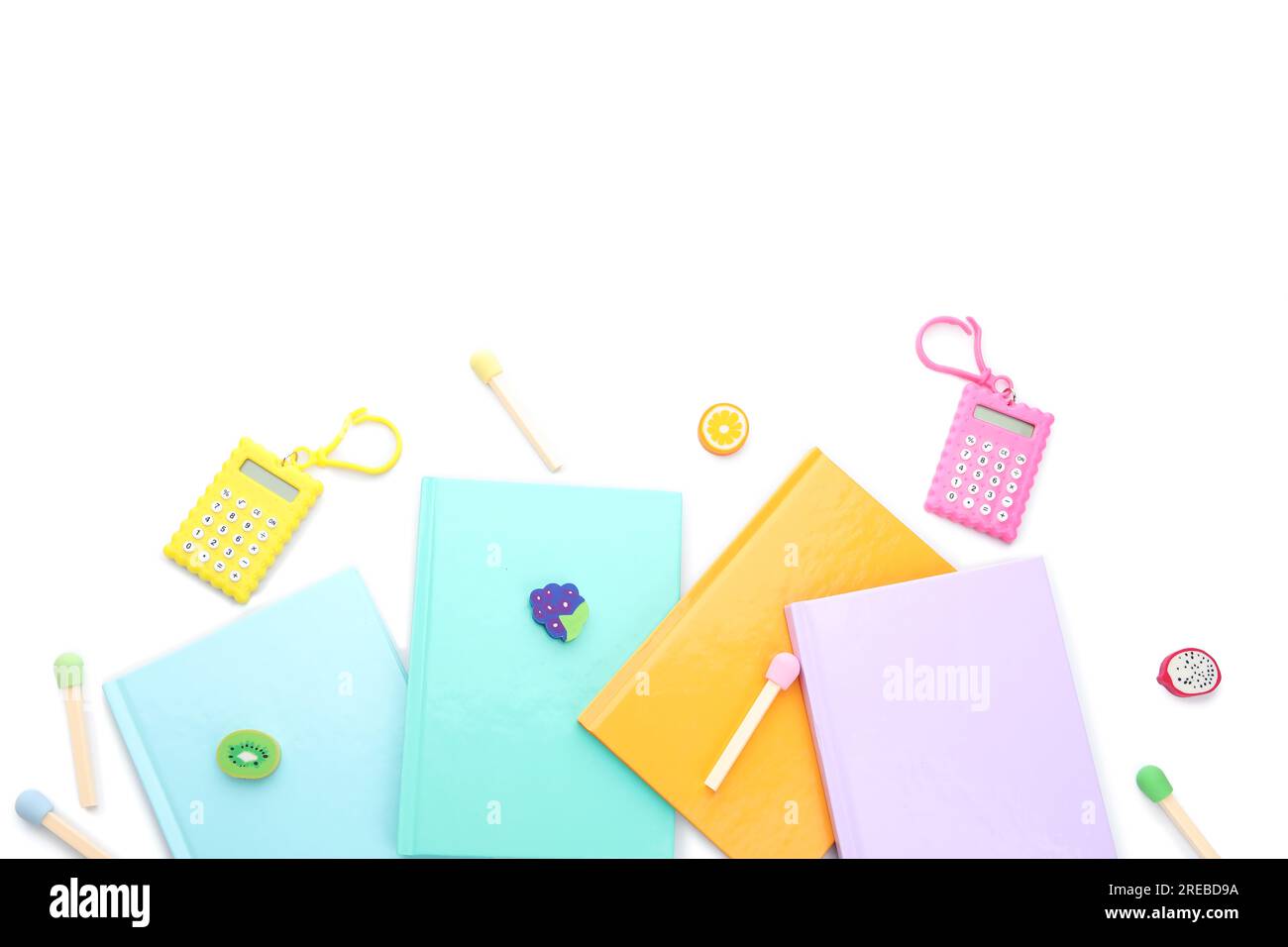 Notebooks and school stationery on white background Stock Photo - Alamy