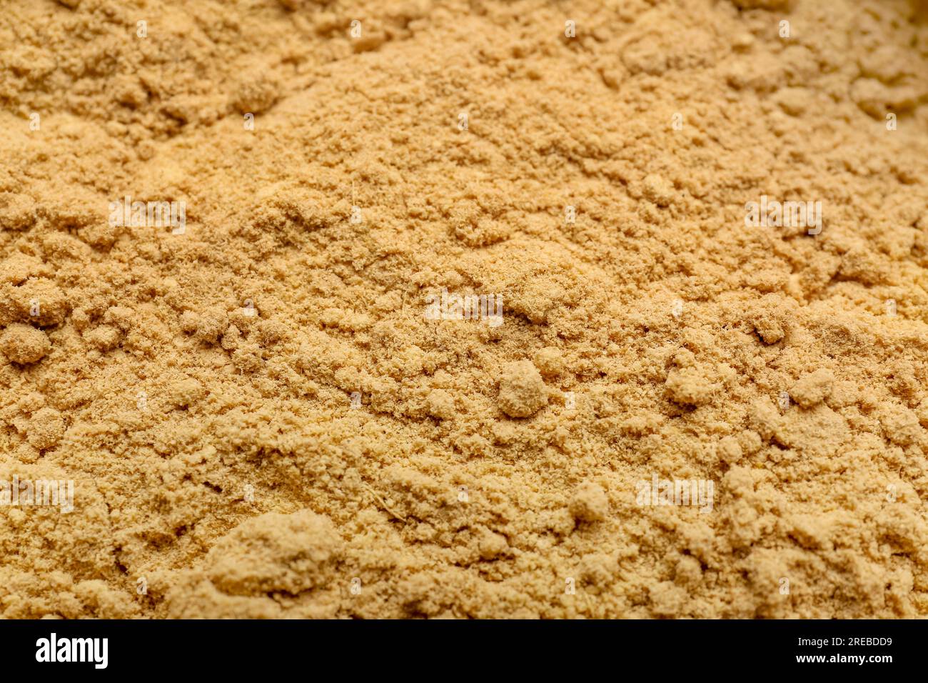 Texture of ginger powder as background Stock Photo - Alamy