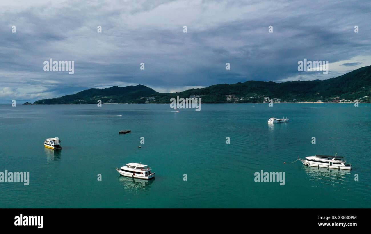 Aerial view of Patong beach in Phuket Province, Thailand with boats ...