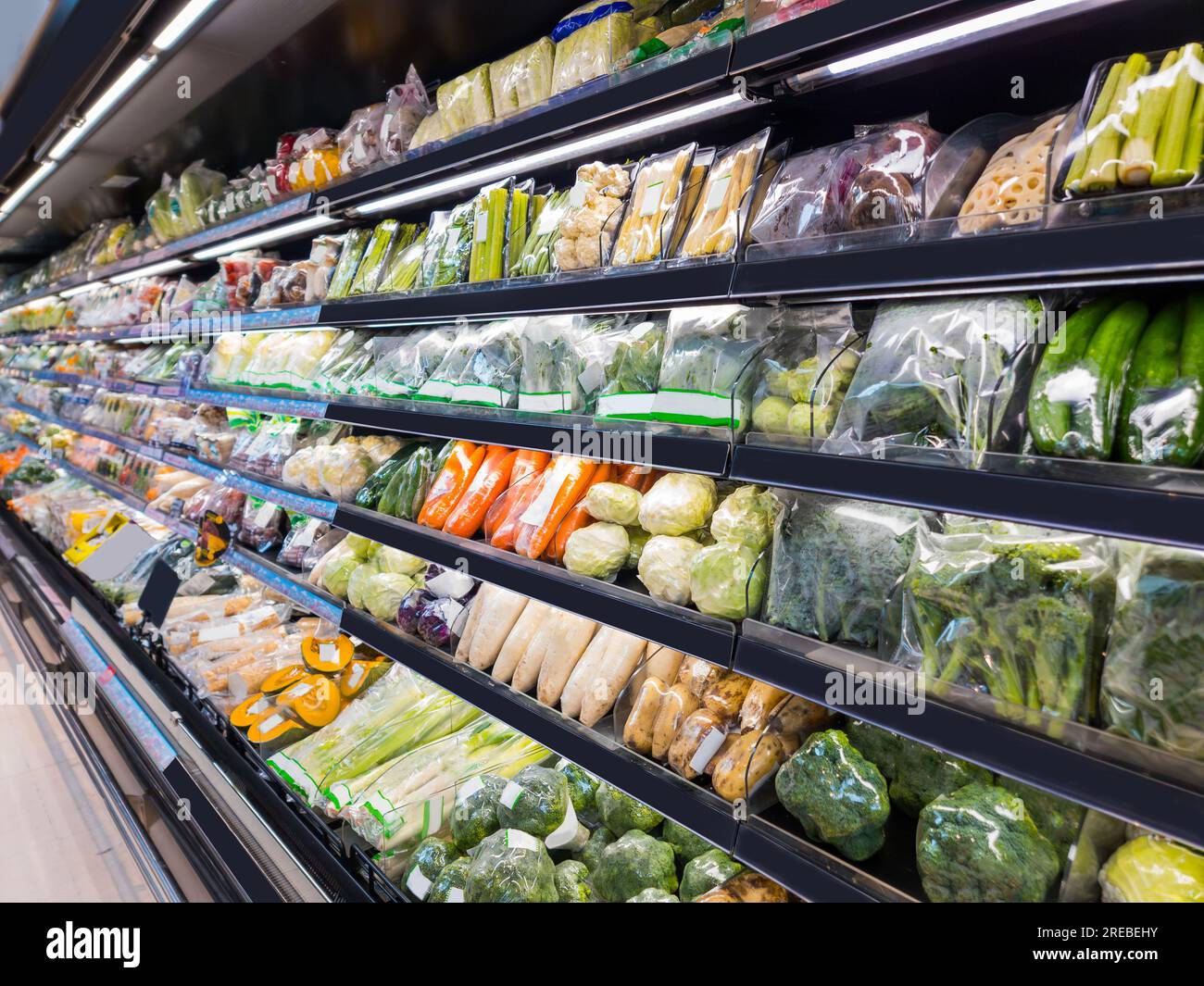 Various of vegetable products on shelf in modern supermarket Stock ...