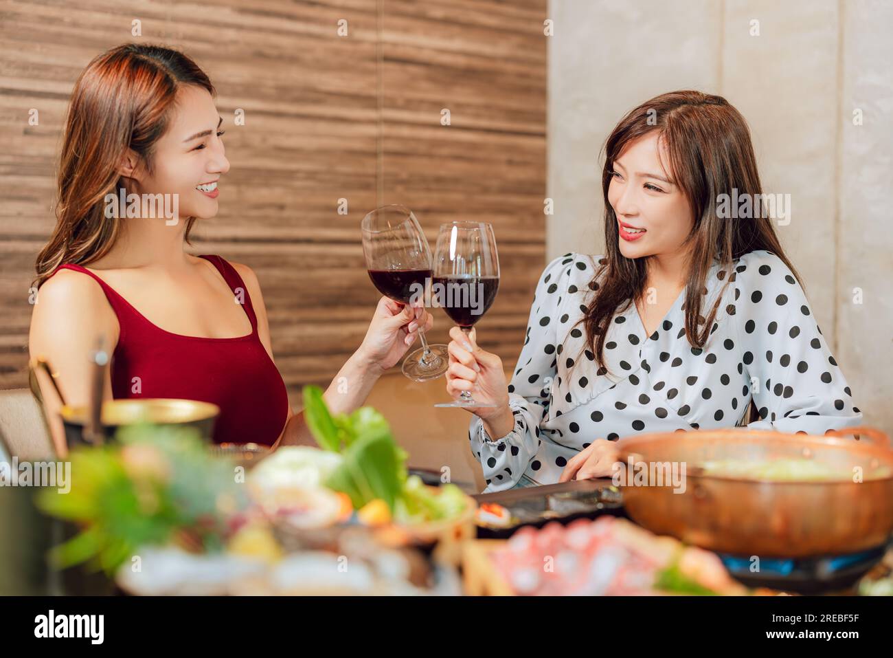 Raise a toast woman hi-res stock photography and images - Alamy