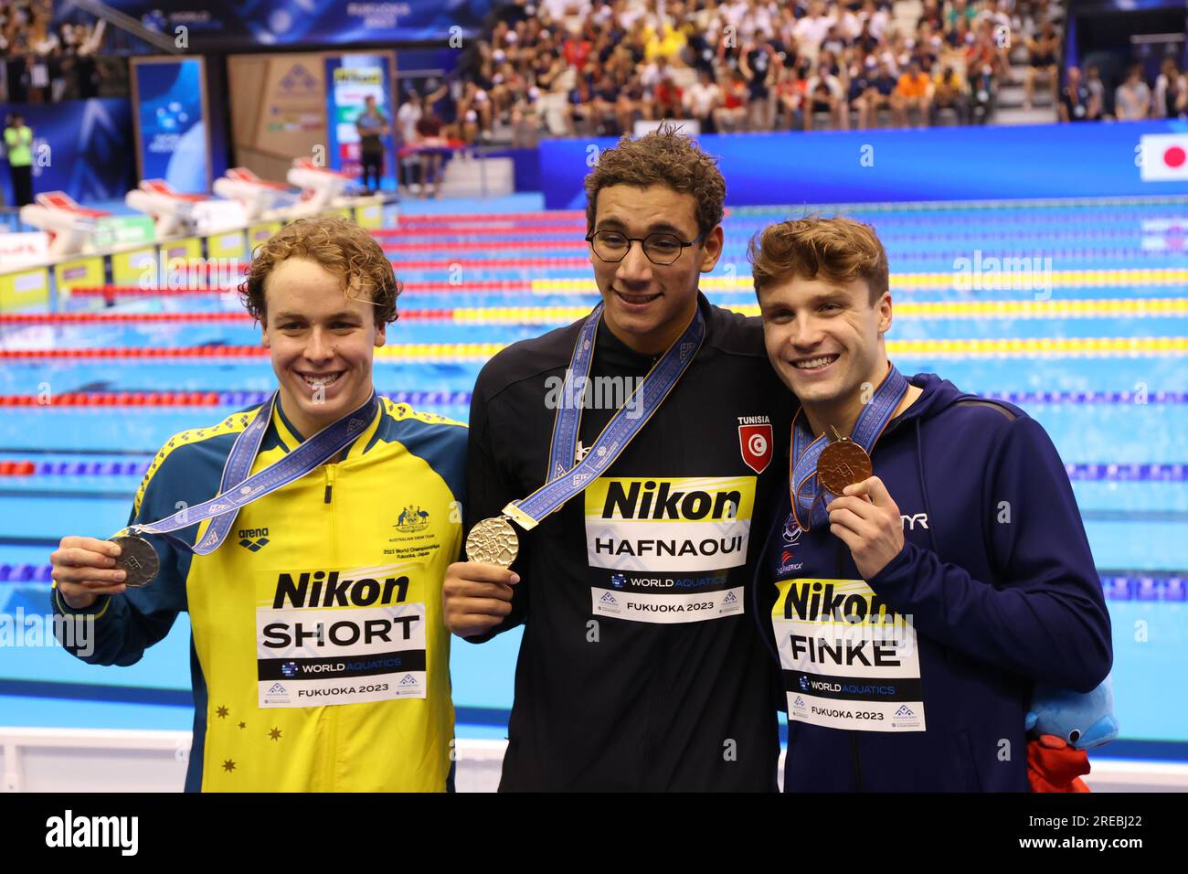 Samuel SHORT (AUS), Ahmed HAFNAOUI (TUN), Bobby FINKE (USA) celebrate ...