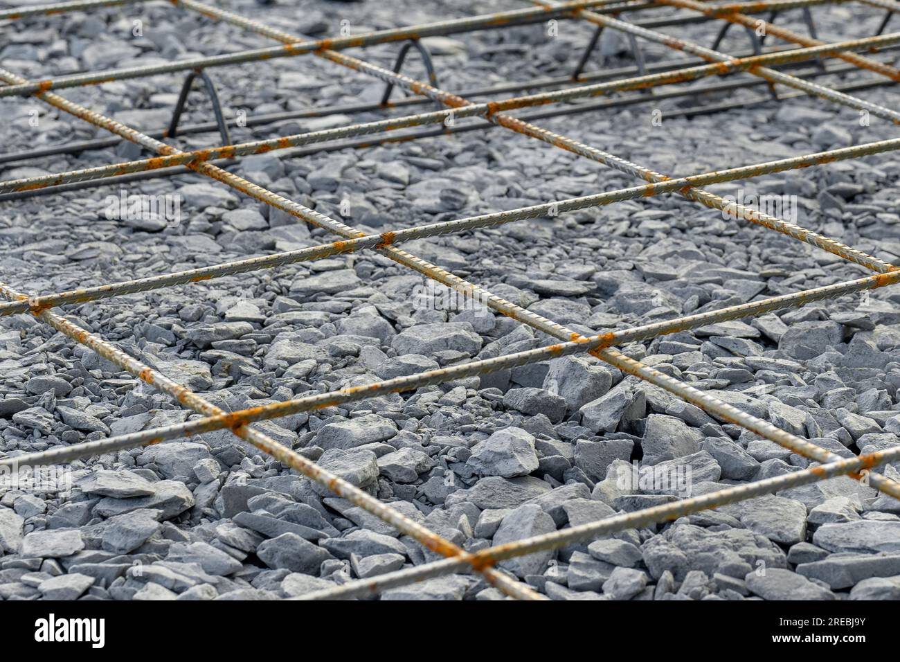 Welded wire mesh, WWM, installed within a sidewalk concrete form prior ...