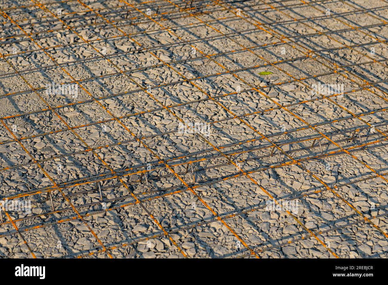 Welded wire mesh, WWM, installed within a sidewalk concrete form prior ...