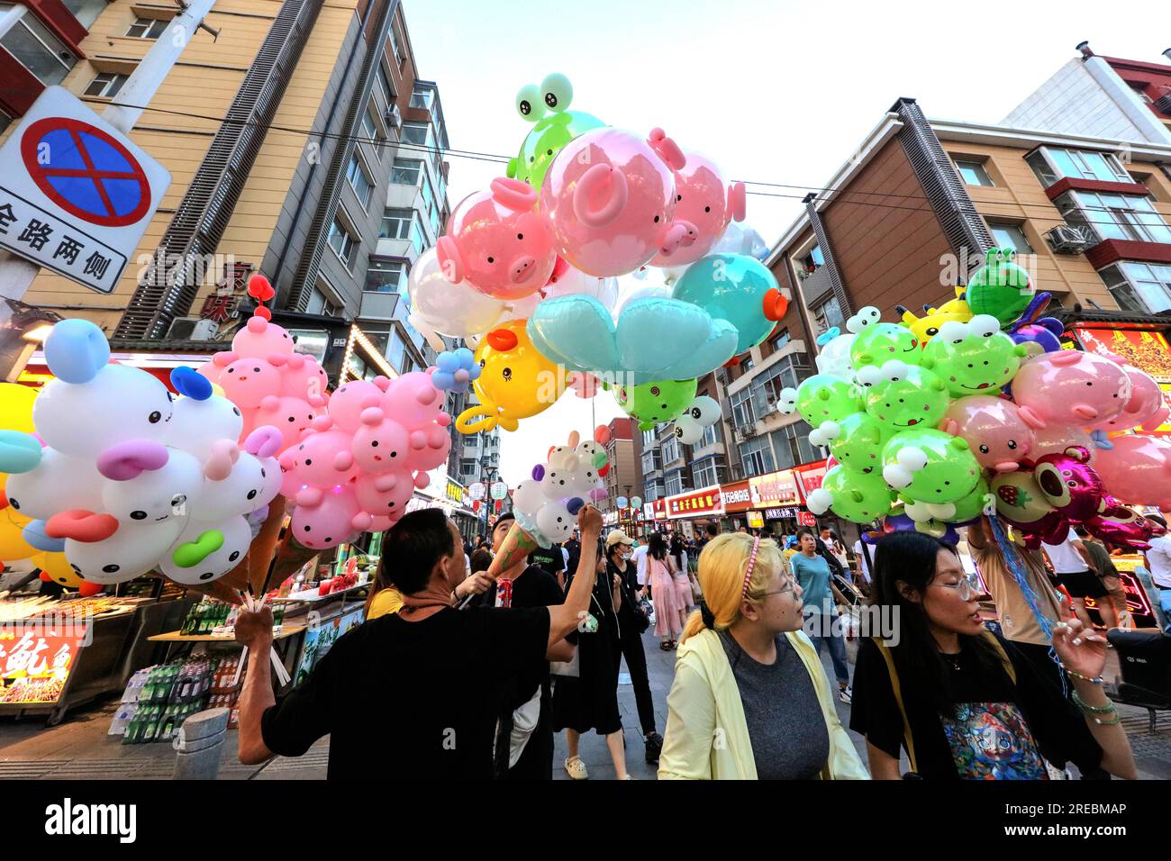 Visit the night market on a food street in Changchun City, northeast ...